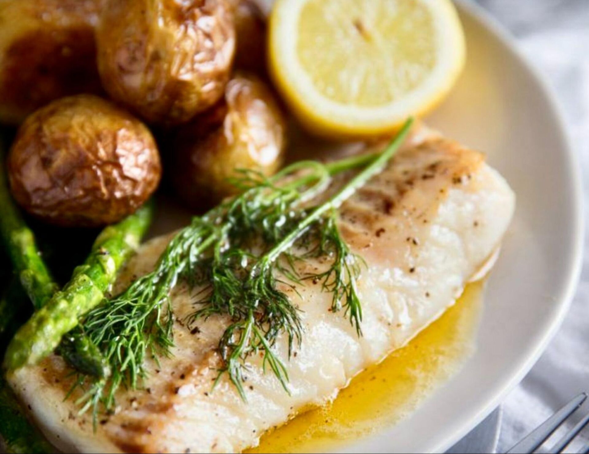 Alaskan Cod with Roasted Garlic Potatoes - Vito's Italian Cucina